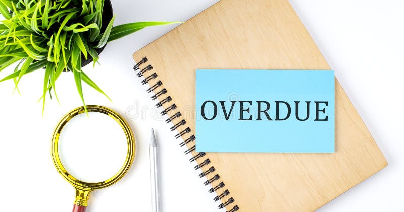 OVERDUE DEBT Text on Paper Sheet with Chart,color Paper and Calculator ...