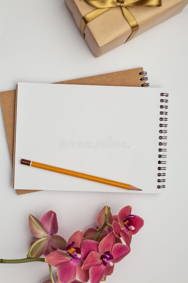 Notebook on White Table with Gift and Pencil Stock Image - Image of ...