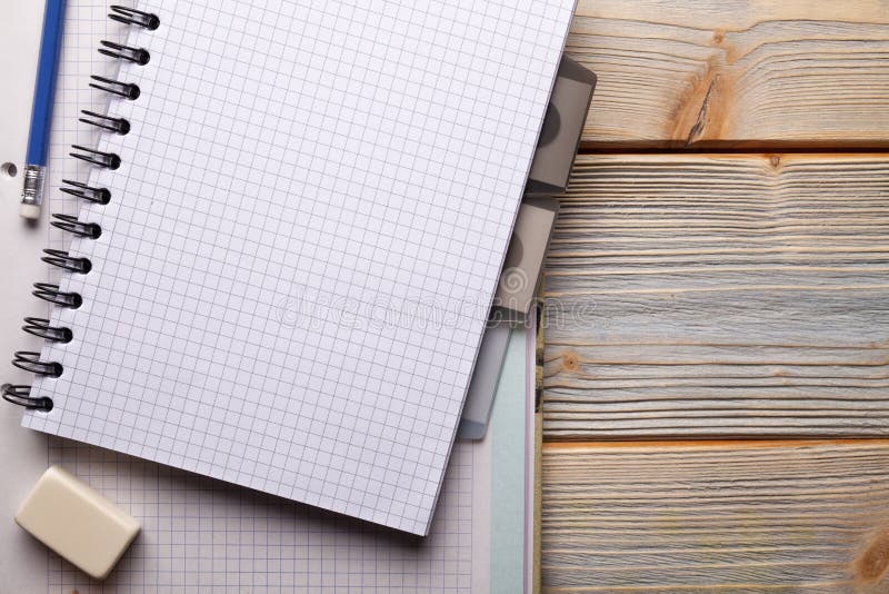 Notebook on wooden board stock image. Image of learning - 77611365