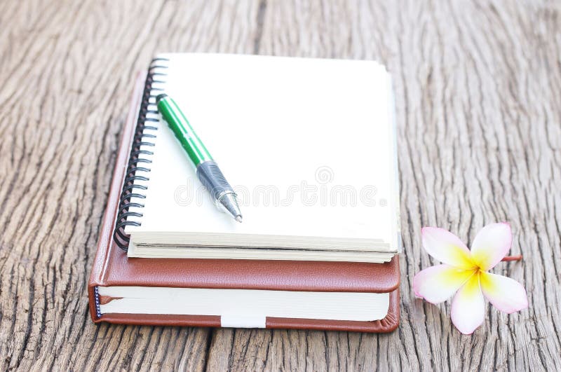 Notebook on wooden table stock image. Image of cover - 55274047