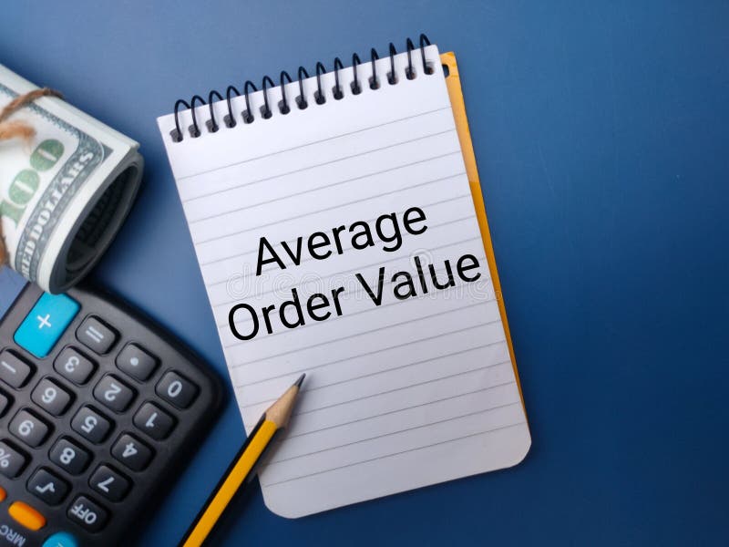 A Notebook with the Words Average Order Value and a Calculator Stock ...