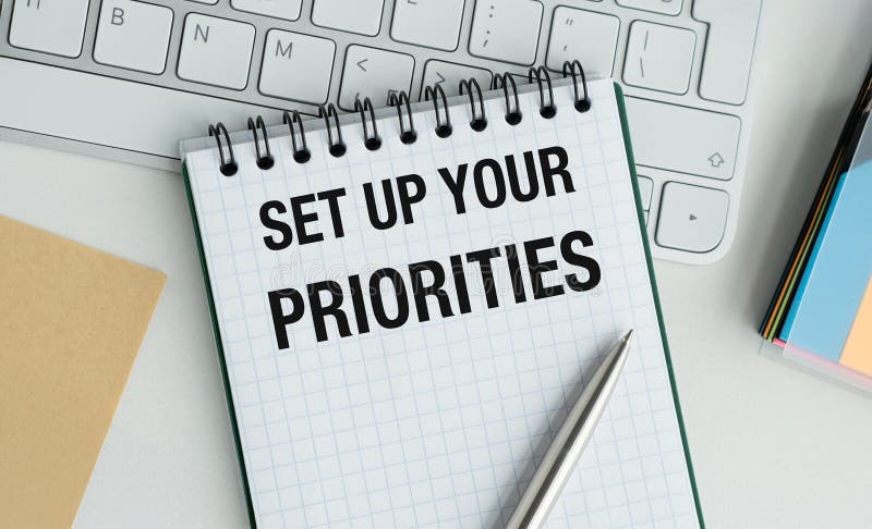 A Notebook with the Words Set Up Your Priorities Written on it. Stock ...