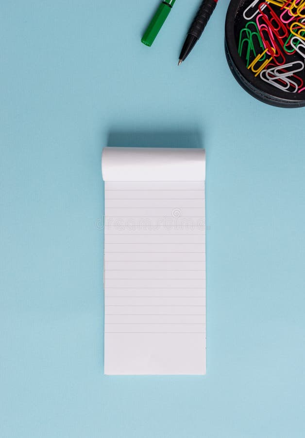 Notebook and Writing Equipment with Computer Tool Above Pastel Backdrop ...