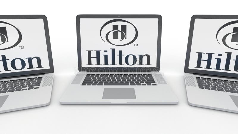 Notebooks with Hilton Hotels Resorts Logo on the Screen. Computer ...