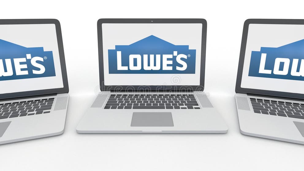 Notebooks with Lowe`s Logo on the Screen. Computer Technology ...