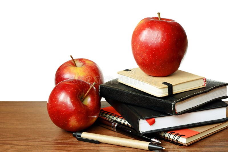 Notebooks, Pens and Apples on a Table Stock Photo - Image of cover ...