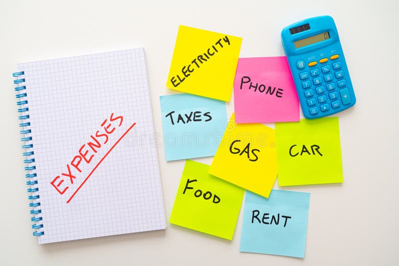 Notepad, and Alongside Adhesive Sheets with a List of Expenses. Stock ...