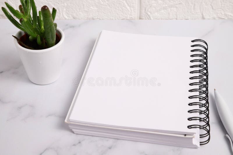 Notepad Blank Paper Mockup on the Table Stock Photo - Image of ...