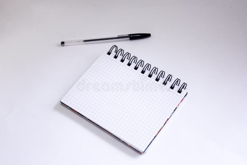 Notepad in a Box on a White Background with a Black Ballpoint Pen Stock ...