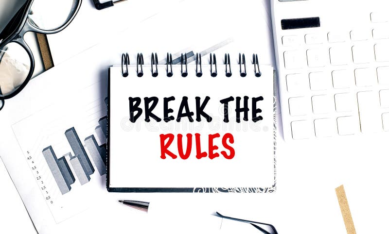 Notepad with Break the Rules Text on Desk with Charts, Glasses ...