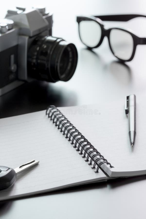 Notepad camera and pen stock image. Image of office, book - 76223539