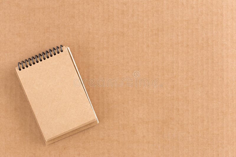 Notepad on Cardboard Background Stock Image - Image of isolated ...