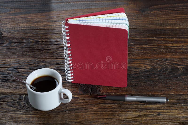Notepad and coffee on desk stock photo. Image of blank - 49268322
