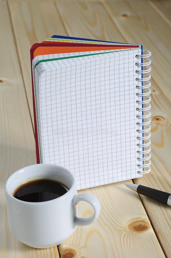 Notepad, coffee and pen stock photo. Image of office - 62980942