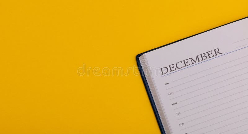 Notepad or Diary on a Yellow Background. Calendar for December. Winter ...