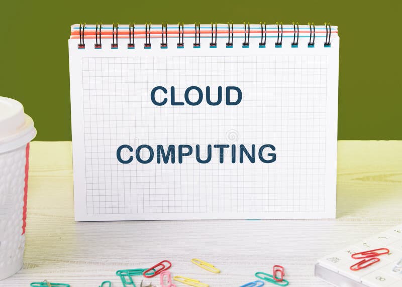 A Notepad Displaying the Phrase Cloud Computing Sits on a Wooden Desk ...