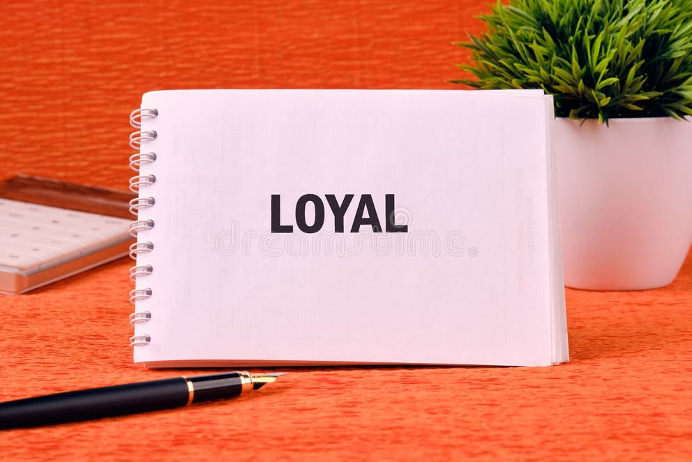 A Notepad Displays the Word Loyal Prominently As a Reminder of ...