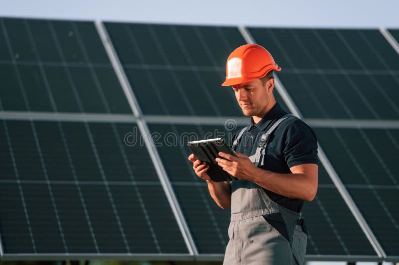 Notepad with Document is in Hands. Man is Doing Operating and ...