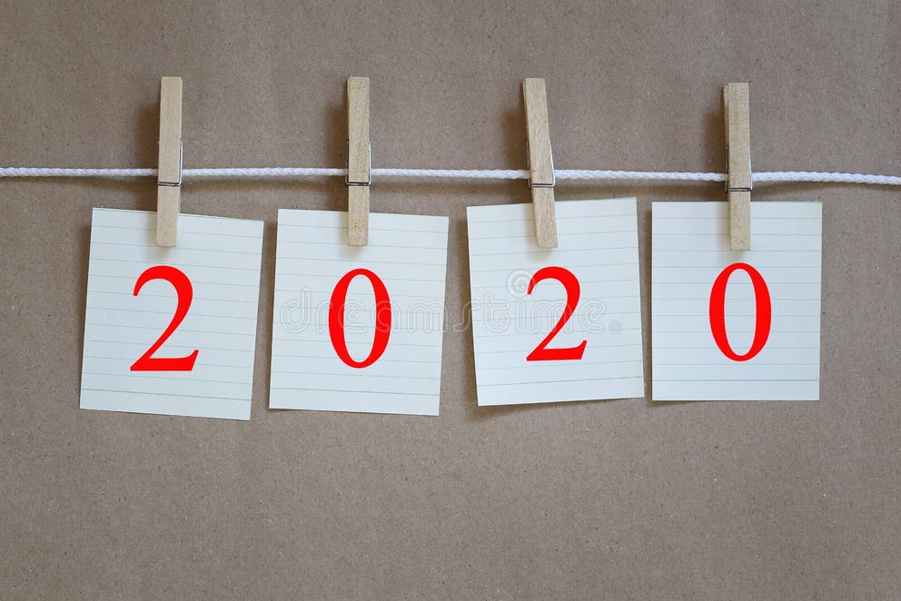 Notepad Empty Hanging on a Rope and 2020 Text on Brown Paper Wall ...