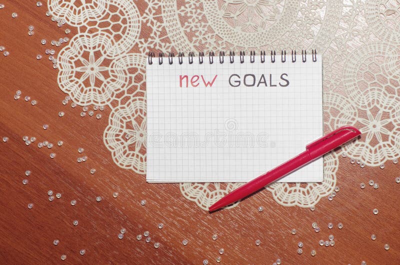 Notepad for Entries on the Table. Handle and Paper on a Wooden S Stock ...