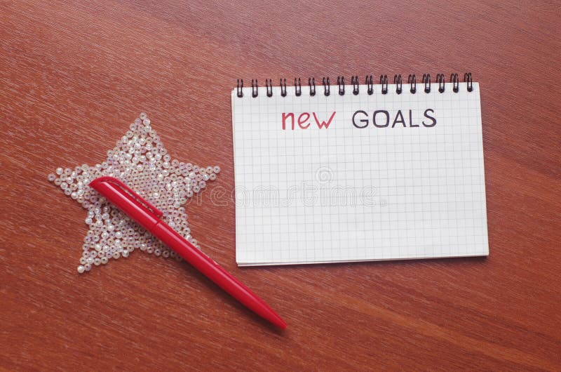 Notepad for Entries on the Table. Handle and Paper on a Wooden S Stock ...