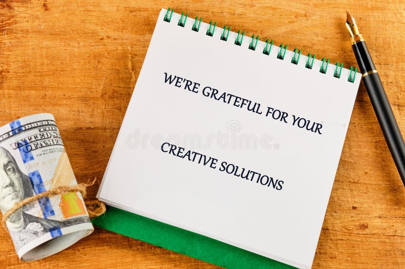 A Notepad with a Message Expressing Gratitude Sits on a Wooden Surface ...