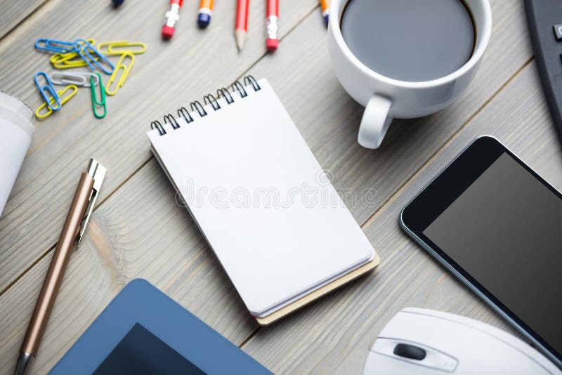 Notepad Next To the Cup of Coffee Smartphone Mouse and Tablet Stock ...