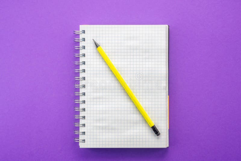 Notepad for Notes and Graphite Pencil on Purple Paper Background Stock ...