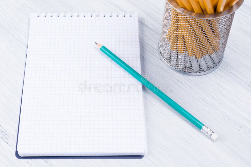 Notepad for Notes and Pencils on a Light Table Stock Image - Image of ...