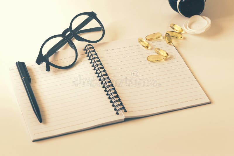 Notepad and Omega 3 Capsule Stock Image - Image of healthcare, brain ...