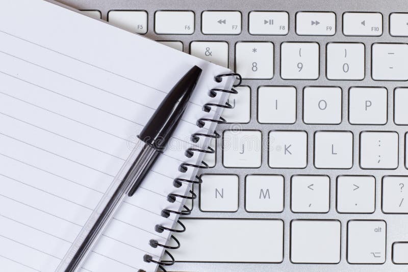 Notepad and Pen on Computer Keyboard Stock Photo - Image of concept ...
