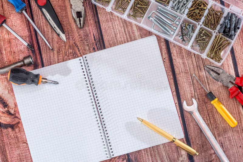 Notepad with Pen on Desk with Work Tolls Stock Photo - Image of dirty ...