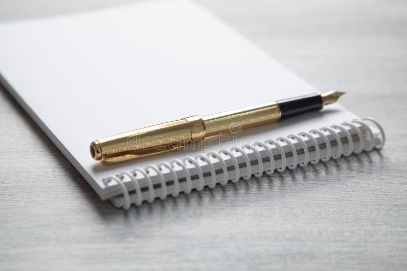 Notepad, Pen, with a Different Business Objects on the Table Stock ...