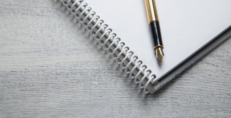 Notepad, Pen, with a Different Business Objects on the Table Stock ...