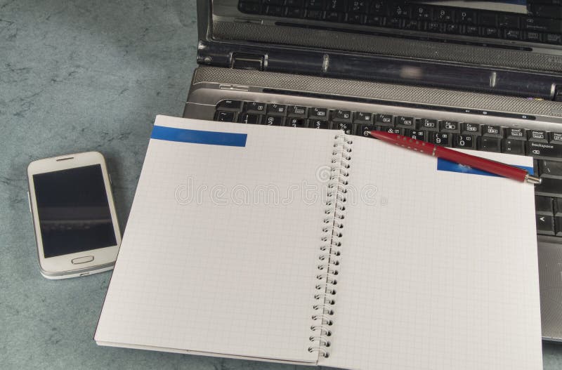 Notepad, Pen, Laptop and Cell Phone with Copy Space Stock Photo - Image ...