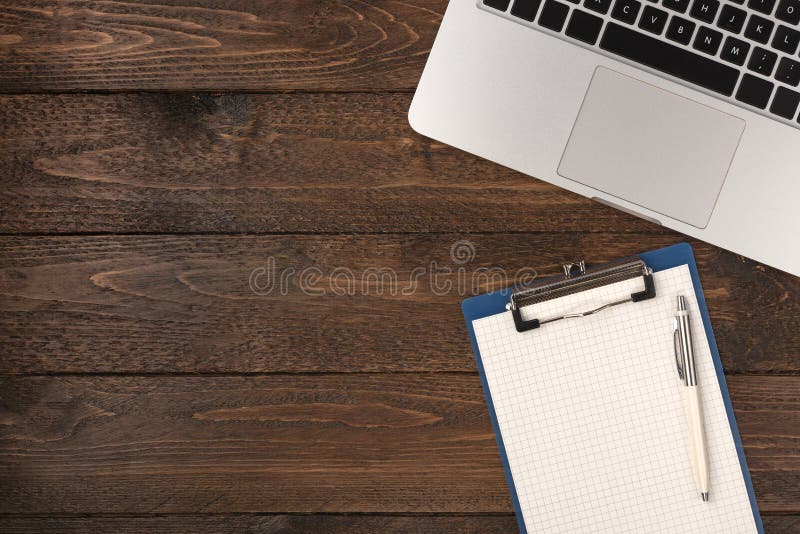 Notepad with Pen and Laptop on the Table. Top View Shot Stock Image ...