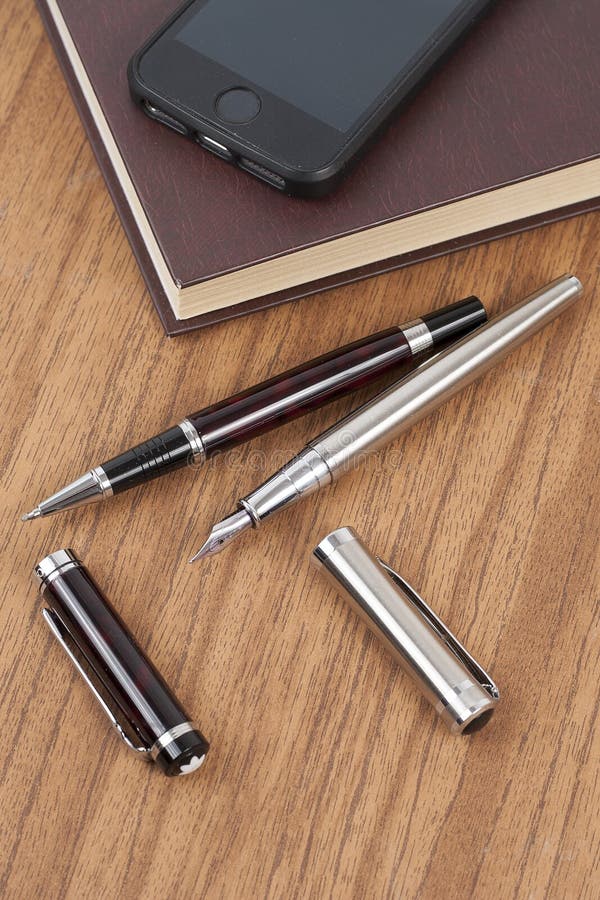 Notepad, Pen and Watches on the Wood Desk Stock Photo - Image of ...