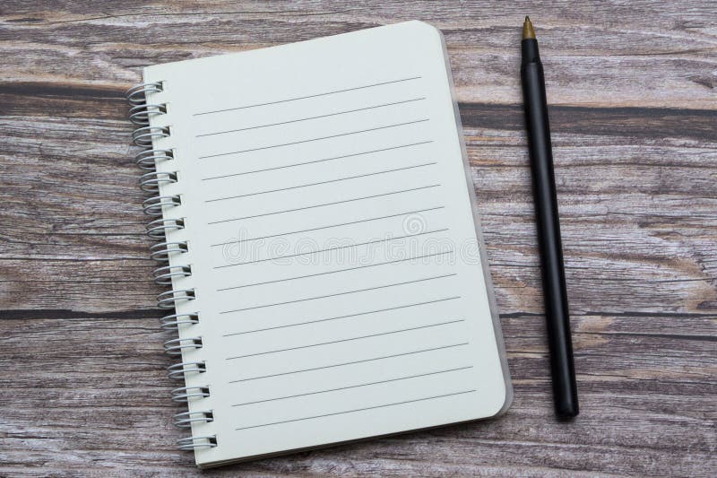 Notepad and Pen on Wooden Table. Stock Image - Image of message ...