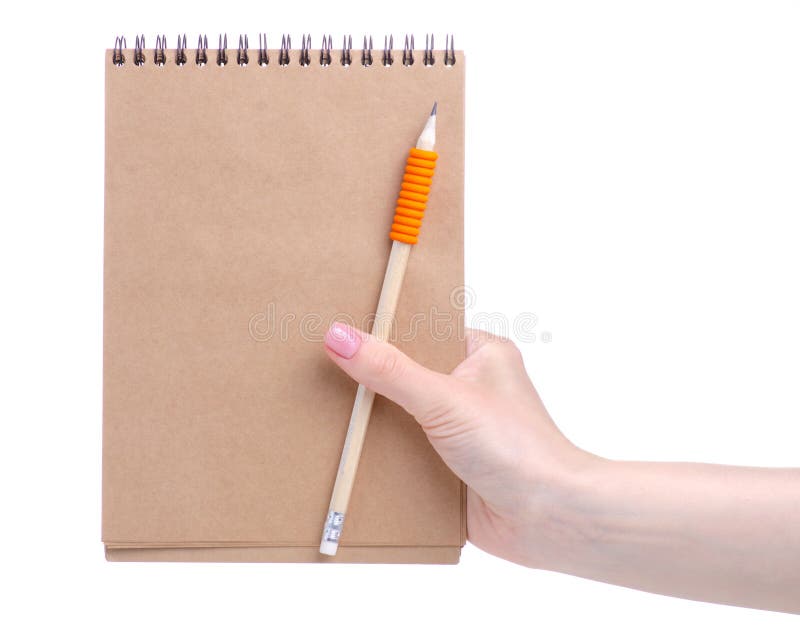 Notepad and pencil in hand stock photo. Image of graphic - 177000750