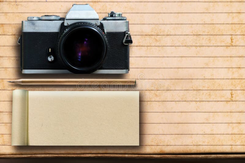 Notepad Pencil and Old Film Camera on Paper Stock Photo - Image of ...