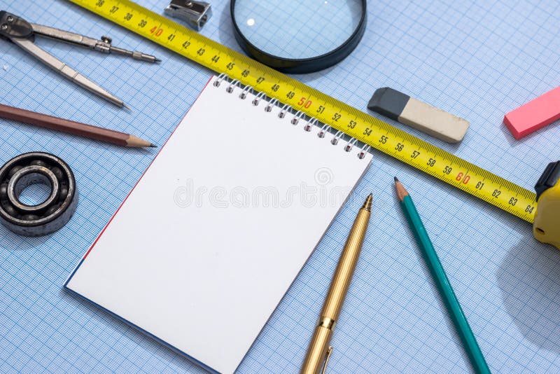 Notepad, Pencil, Ruler and Compass on Graph Paper Stock Image - Image ...