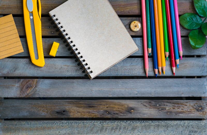 Notepad with Pencil on Wood Board Background.using Wallpaper for ...