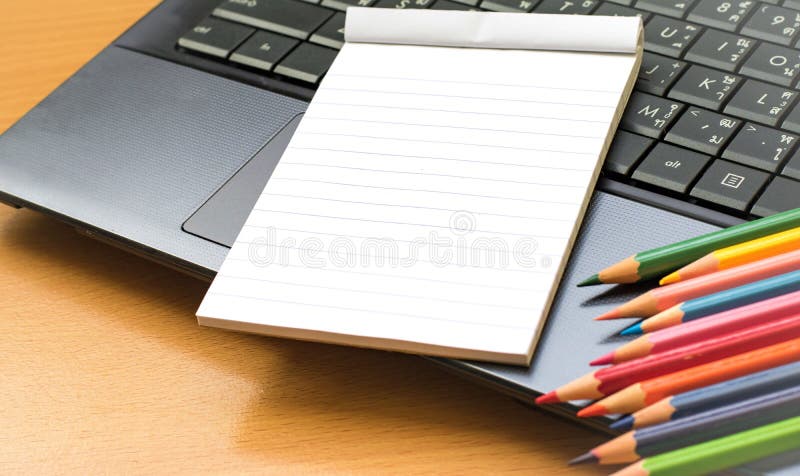 Notepad with Pencil on Wood Board Background. Using Wallpaper or ...