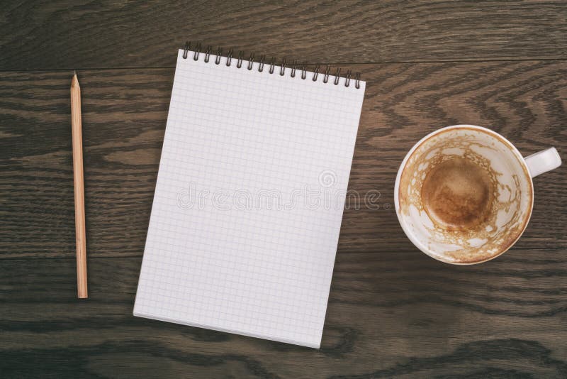 Notepad with Pencil on Wood Table and Empty Coffee Cup Stock Image ...