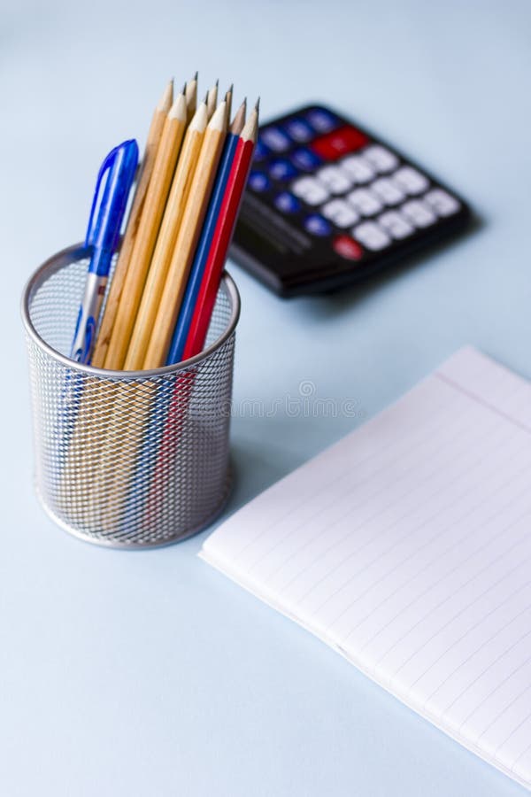 Notepad and Pencils, on a White Napkin Next To a Bouquet of White ...