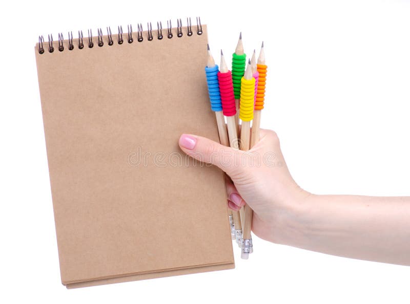 Notepad and Pencils in Hand Stock Image - Image of album, human: 177000765