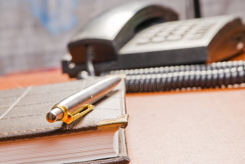 Notepad and phone stock photo. Image of table, single - 18249430