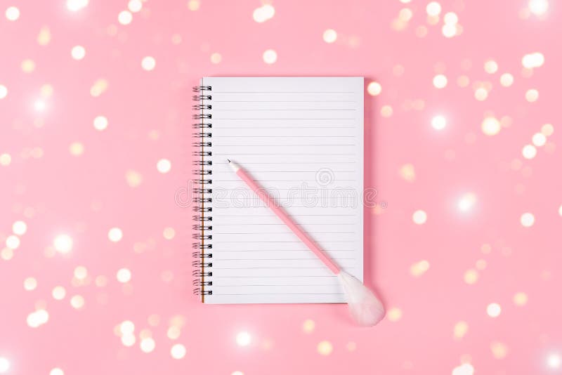 Notepad and Pink Pen Decorated with Feather on Pink Background. Holiday ...