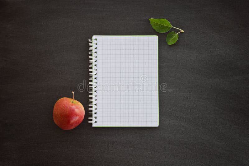 Notepad and Red Apple on Chalkboard Stock Photo - Image of education ...