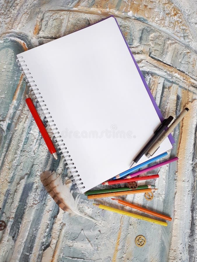 Notepad for the Sketch on a Colourful Background with a Pencils Stock ...